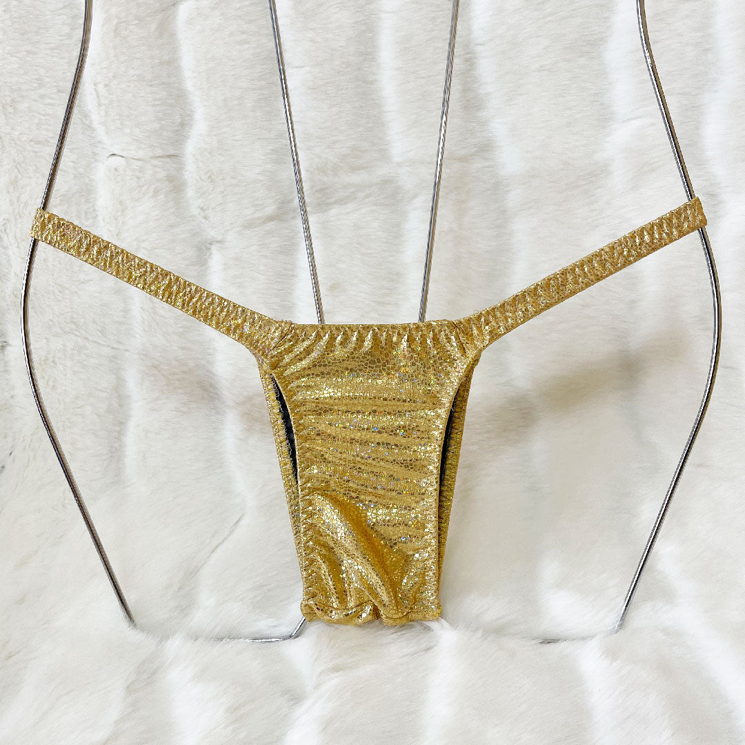 Tanga trucadora dorada – Nando Barcelona